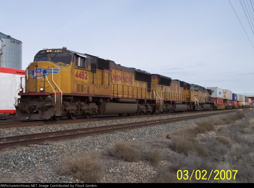 UP 4482 leads eastbound double stack train